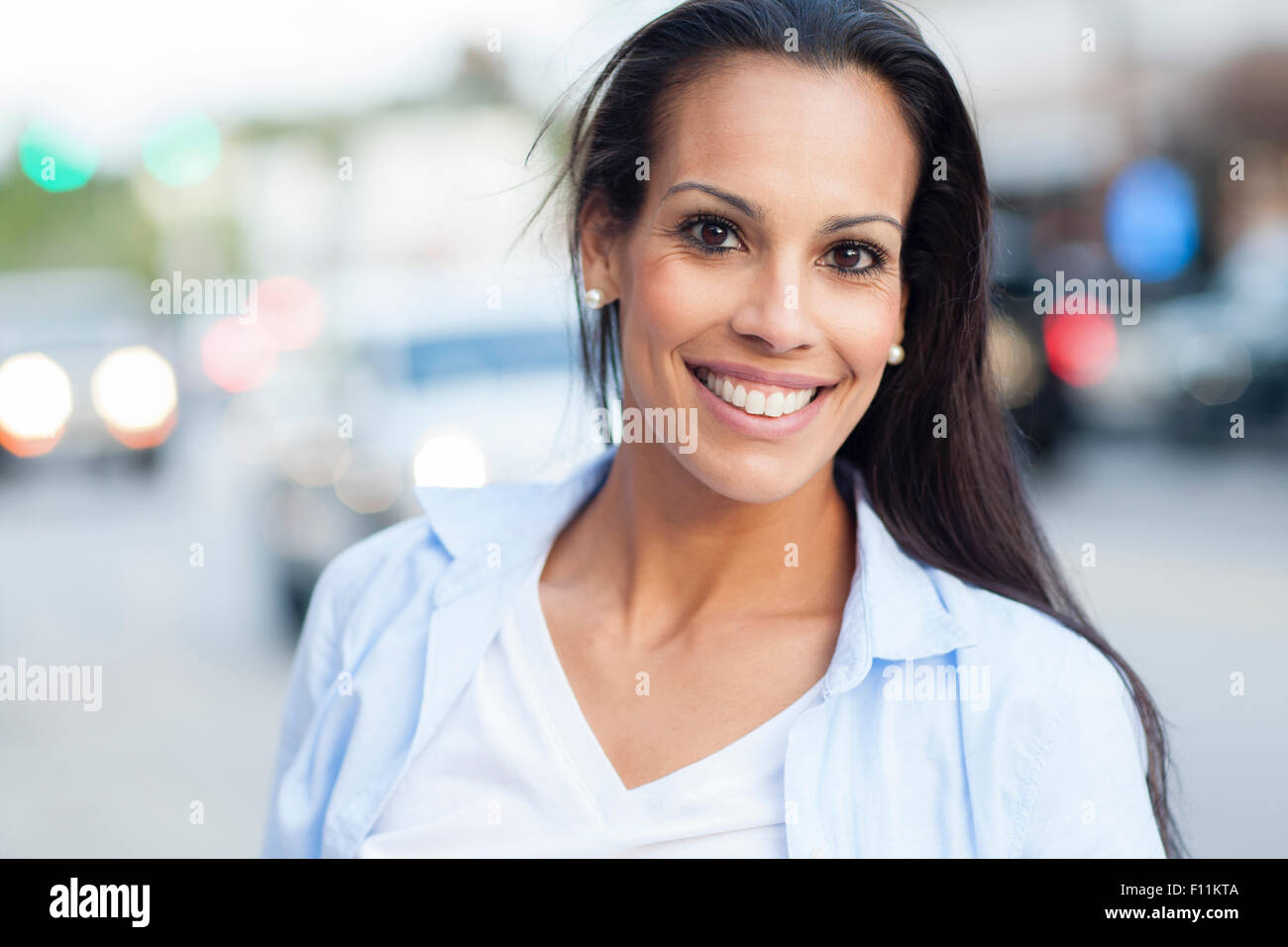 Close up of Hispanic woman smiling outdoors Stock Photo - Alamy