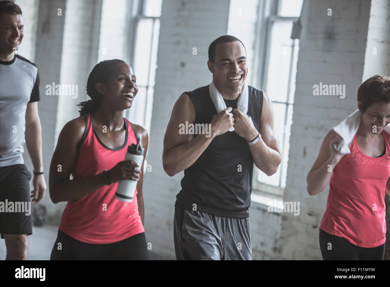 Athletes talking in gym Stock Photo - Alamy