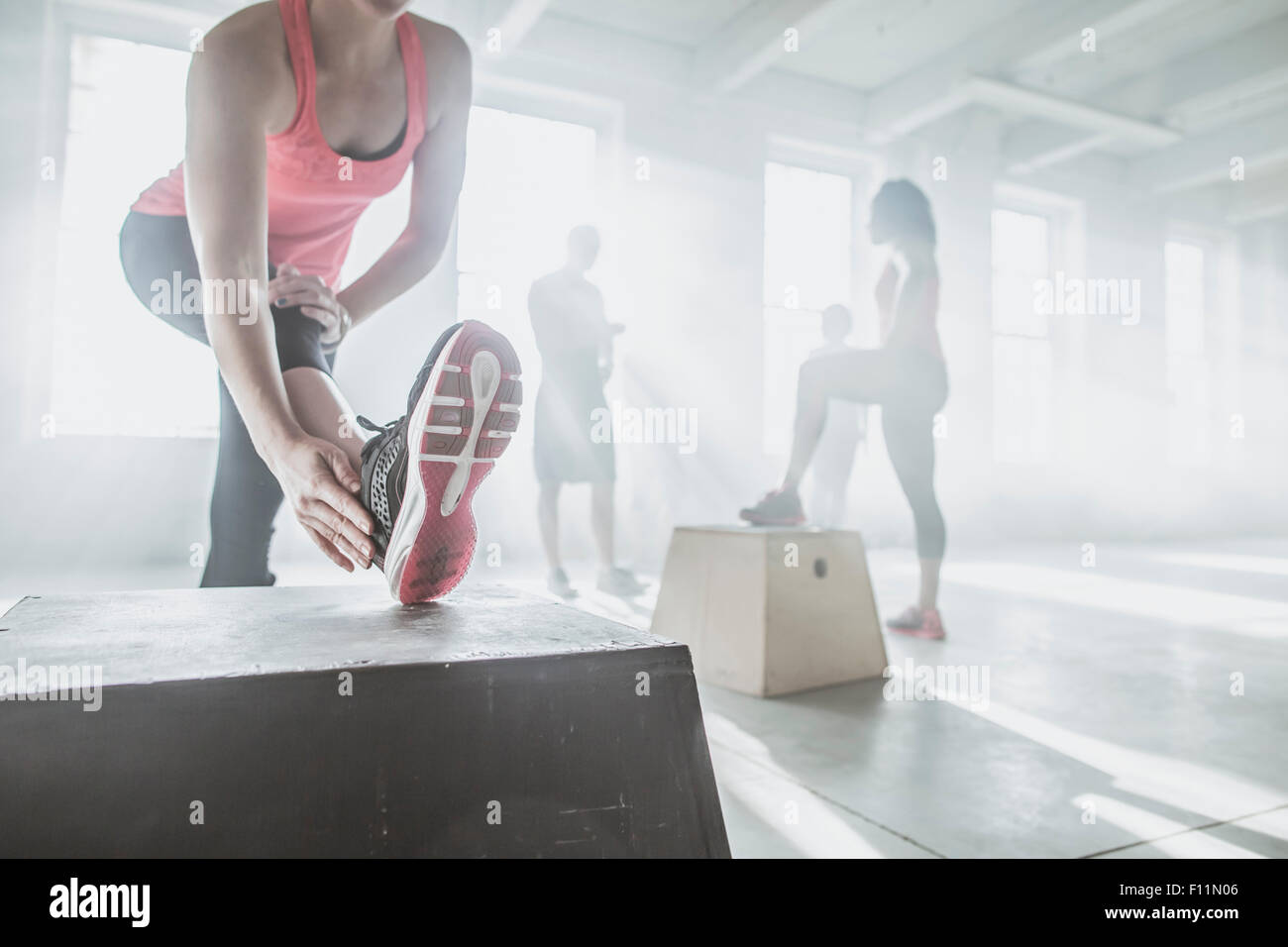 Woman stretching in box hi-res stock photography and images - Alamy