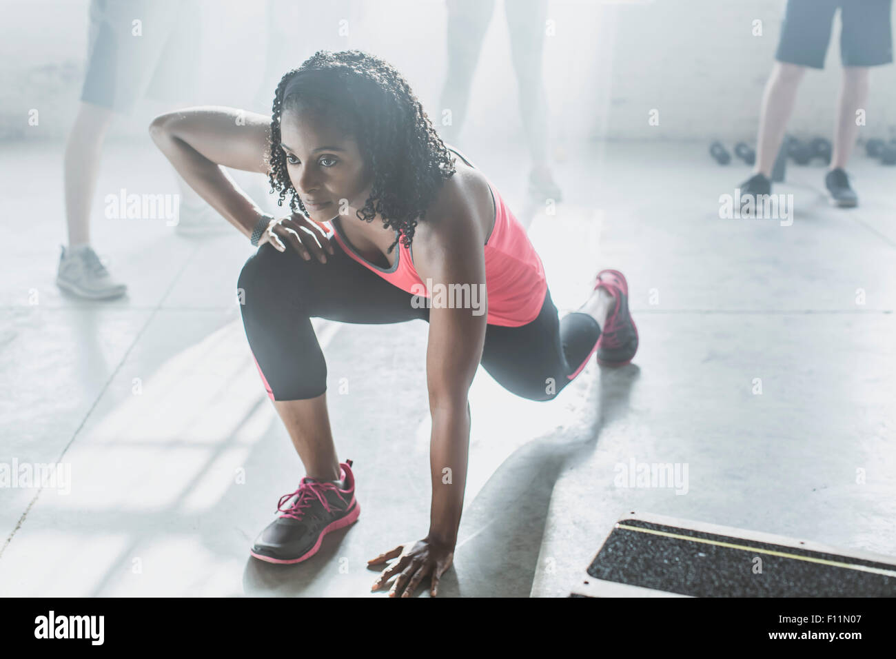 High angle view of athlete stretching in gym Stock Photo - Alamy