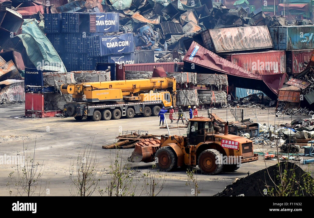 Tianjin, China. 25th Aug, 2015. Rescuers work at the core area of ...