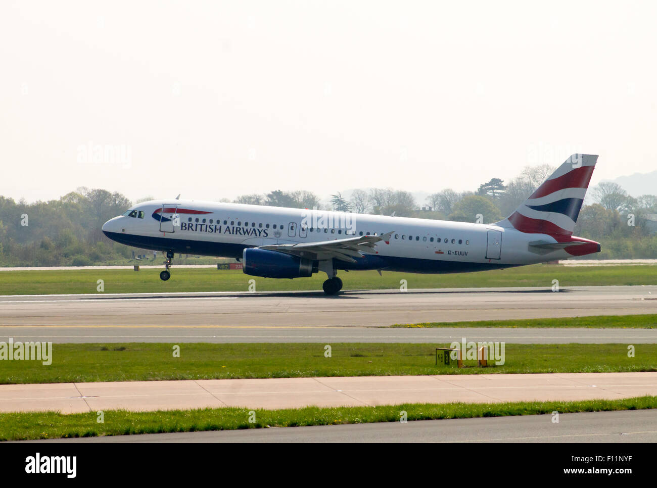British Airways Airbus A320 (G-EUUV) taking off from Manchester Airport ...