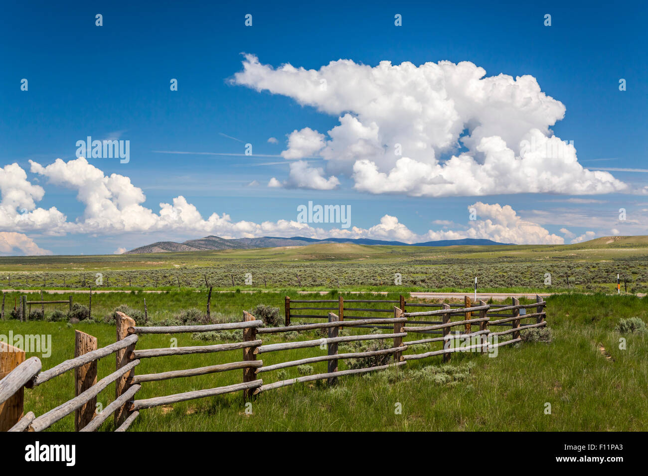 A roadway with storm clouds forming in rural Utah, USA Stock Photo - Alamy