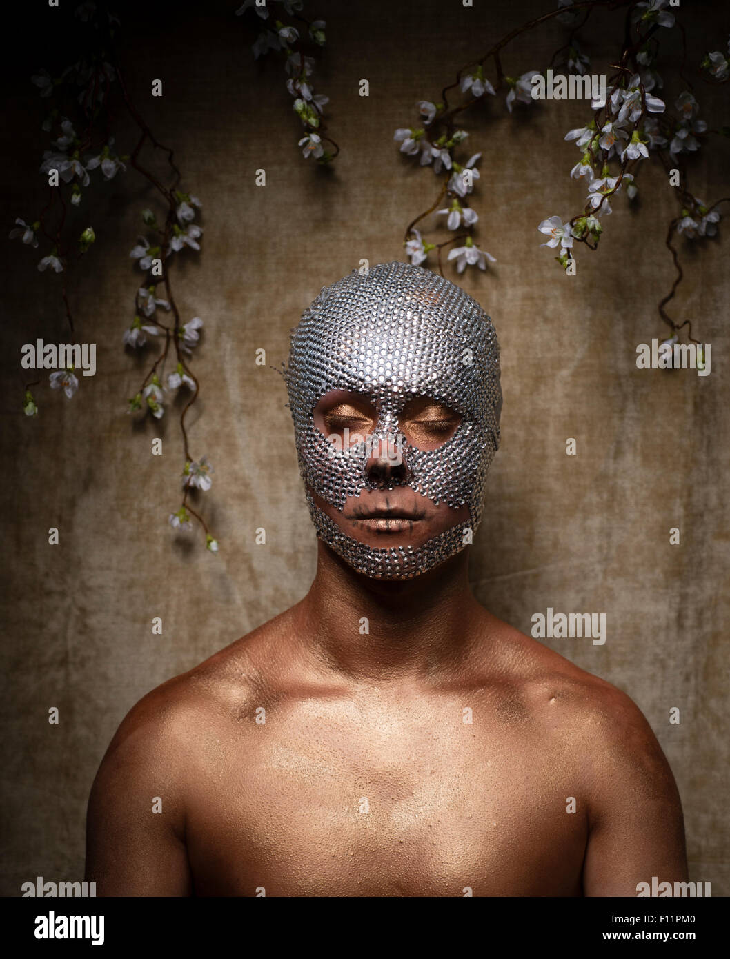 'Day of the Dead' theme portrait - a young man with crystal sequins ...