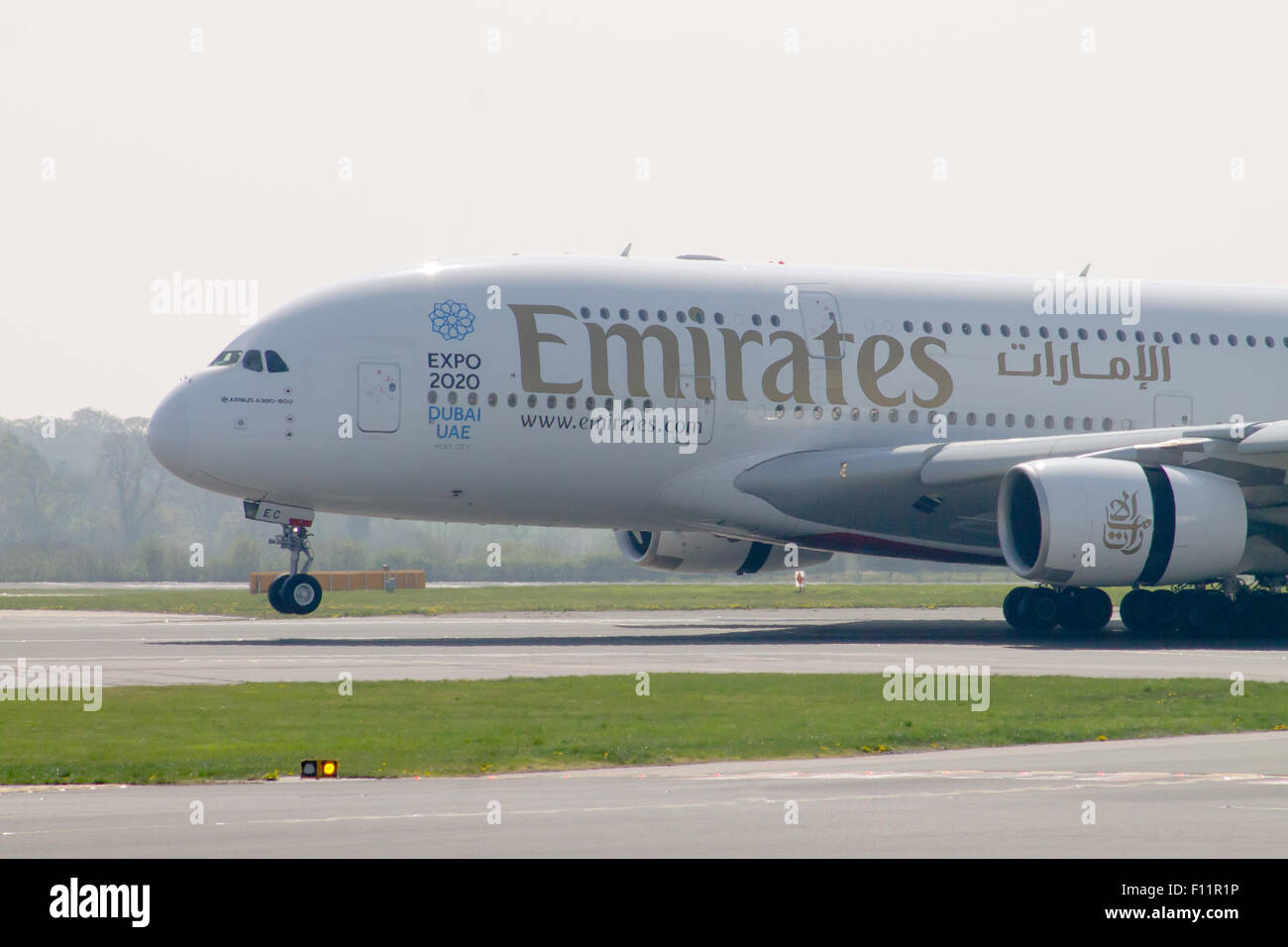 Emirates Airbus A380 landing to Manchester Airport Stock Photo - Alamy