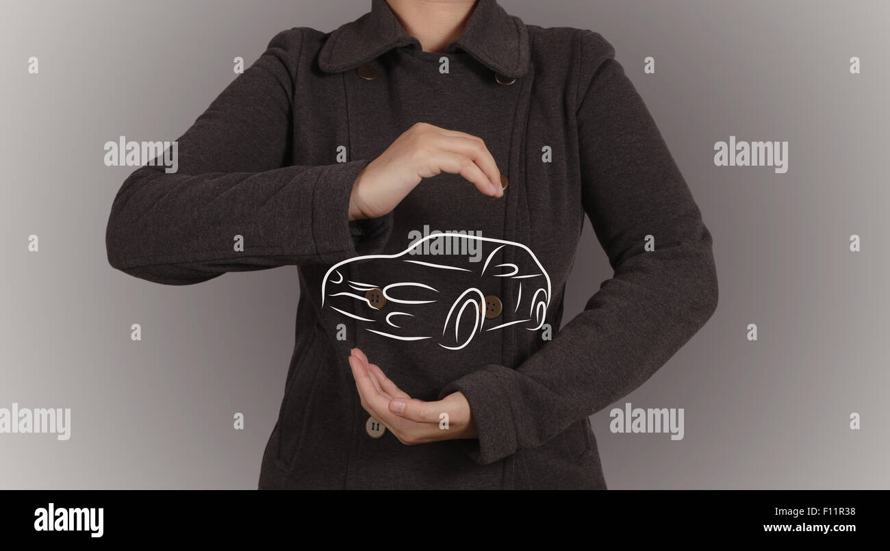 businessman protect hand drawn of silhouette of car as insurance ...