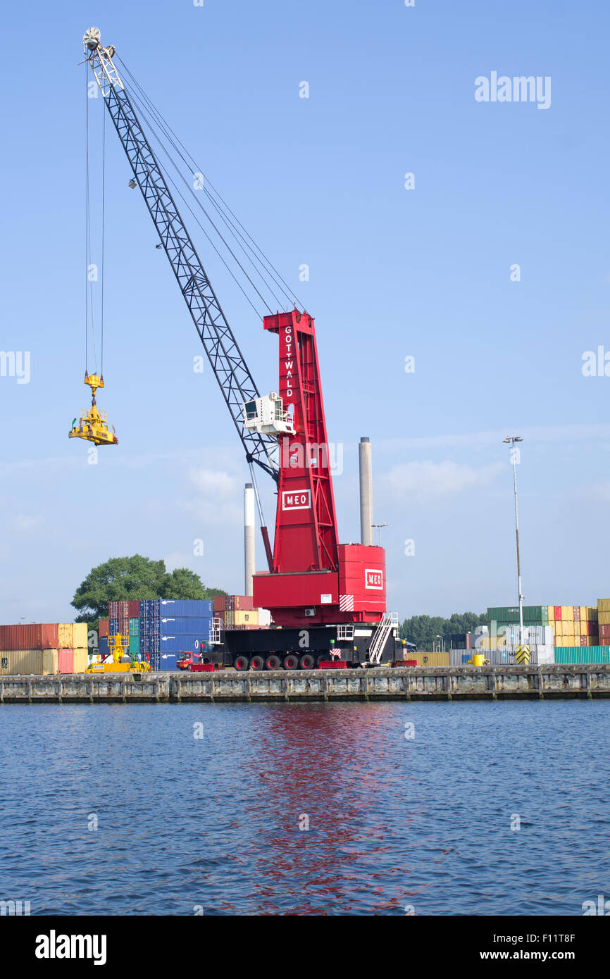 Dockside crane at container port Stock Photo - Alamy