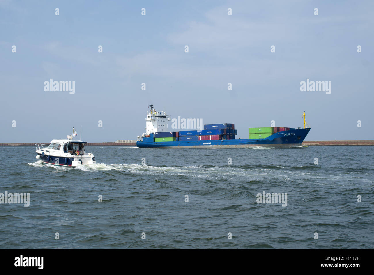 Large blue cargo ship enters Dutch Port Stock Photo - Alamy