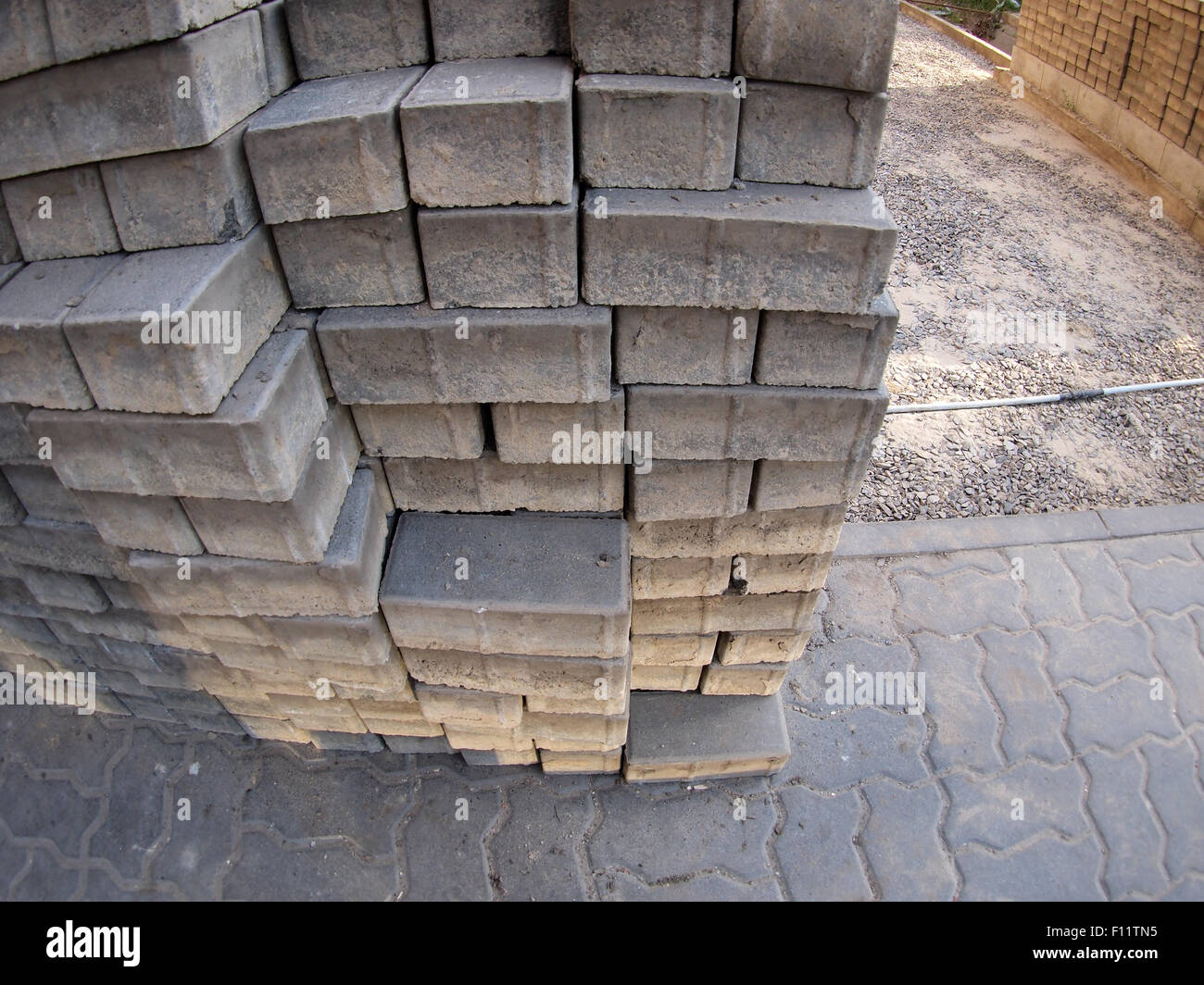 The process of laying paving covering the street with wide angle ...