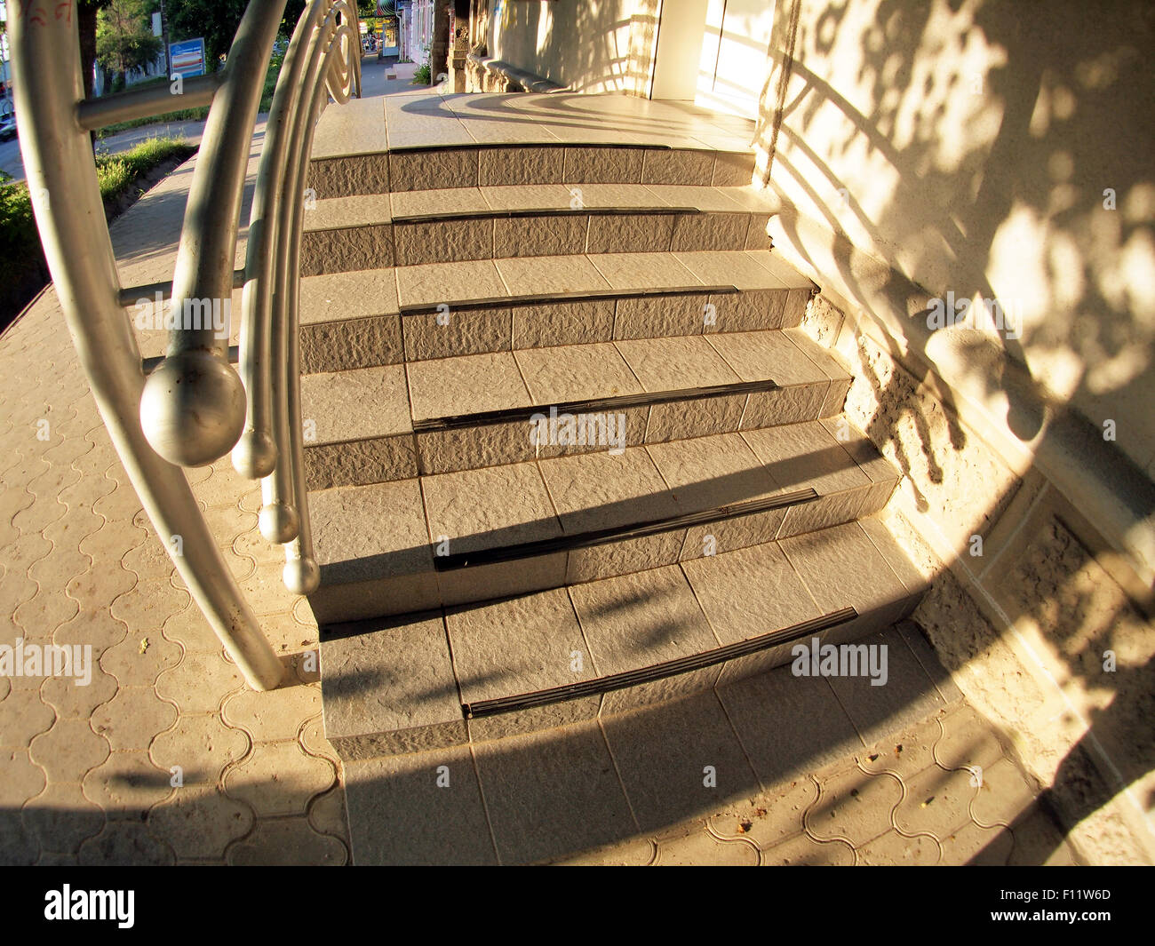 Top view of the stairs outside the building on the street closeup with ...