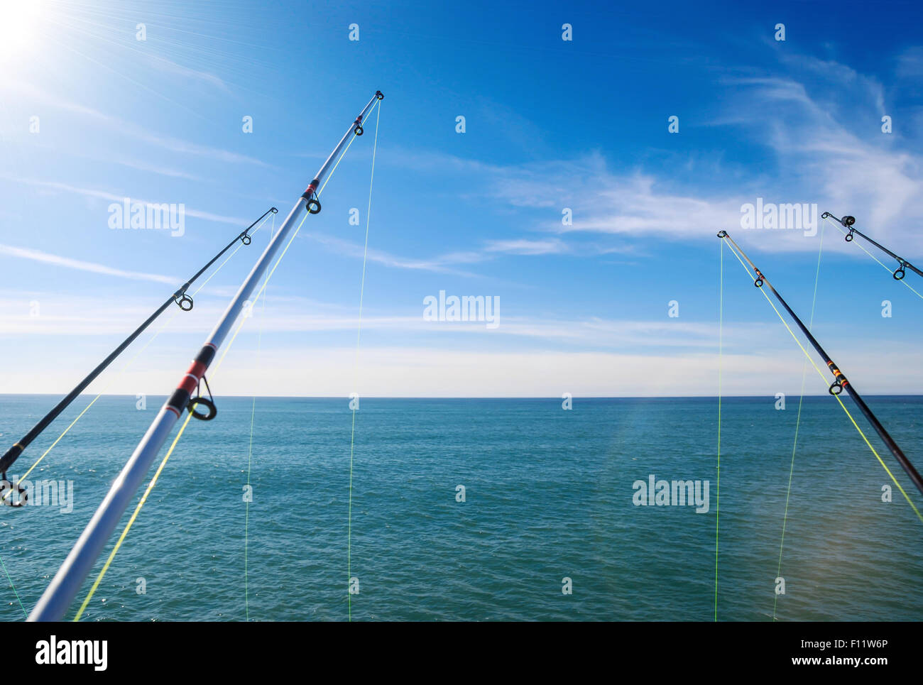 fishing on deep ocean under blue sky Stock Photo - Alamy