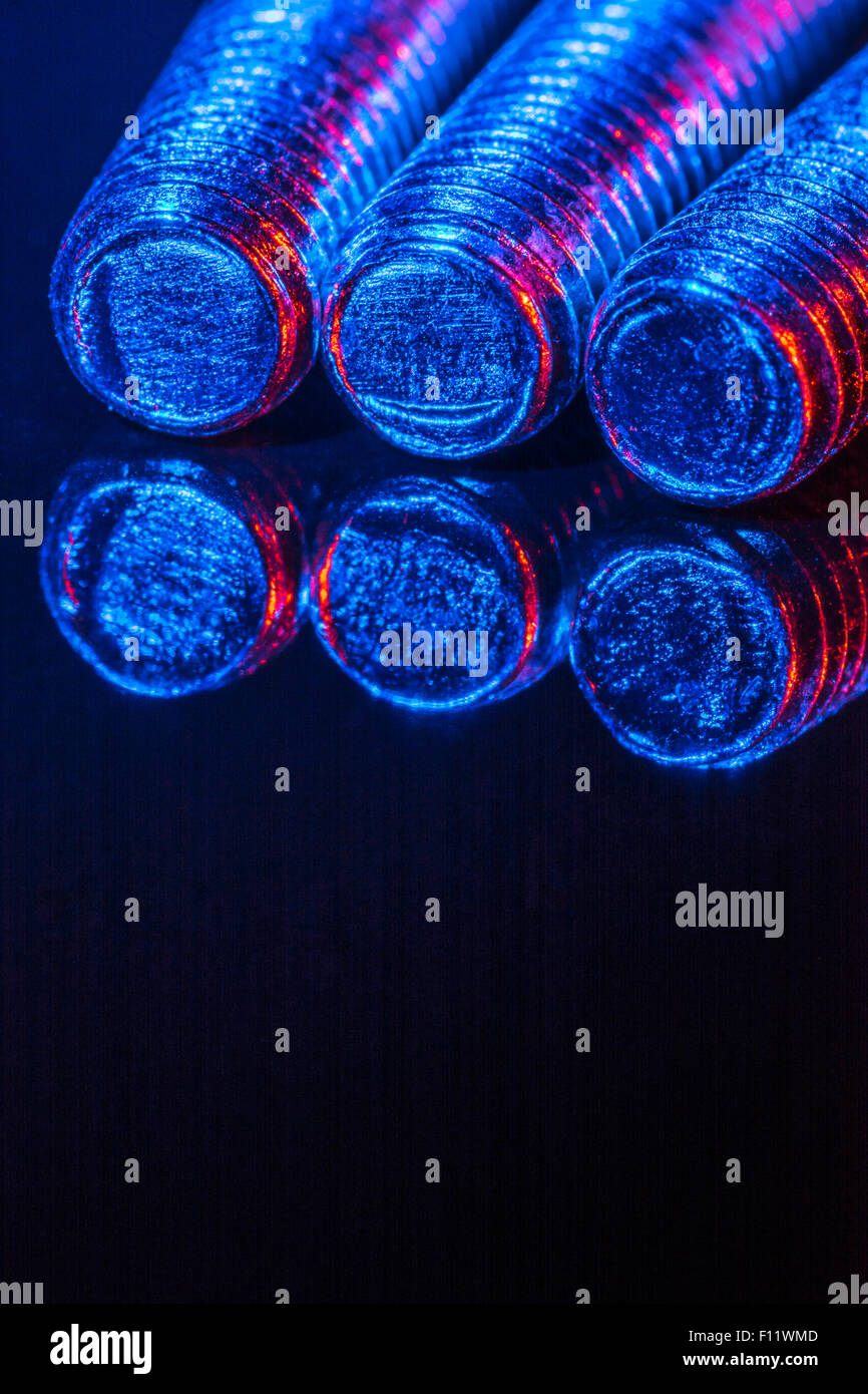 Macro-photo of small screw threaded bolts Stock Photo - Alamy