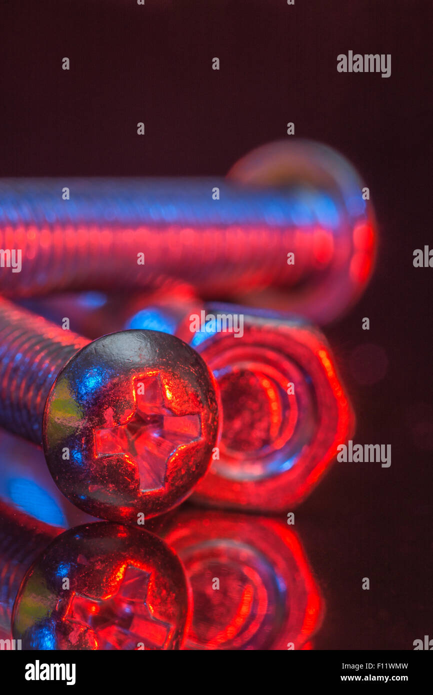 Macro-photo of small screw threaded bolts Stock Photo - Alamy