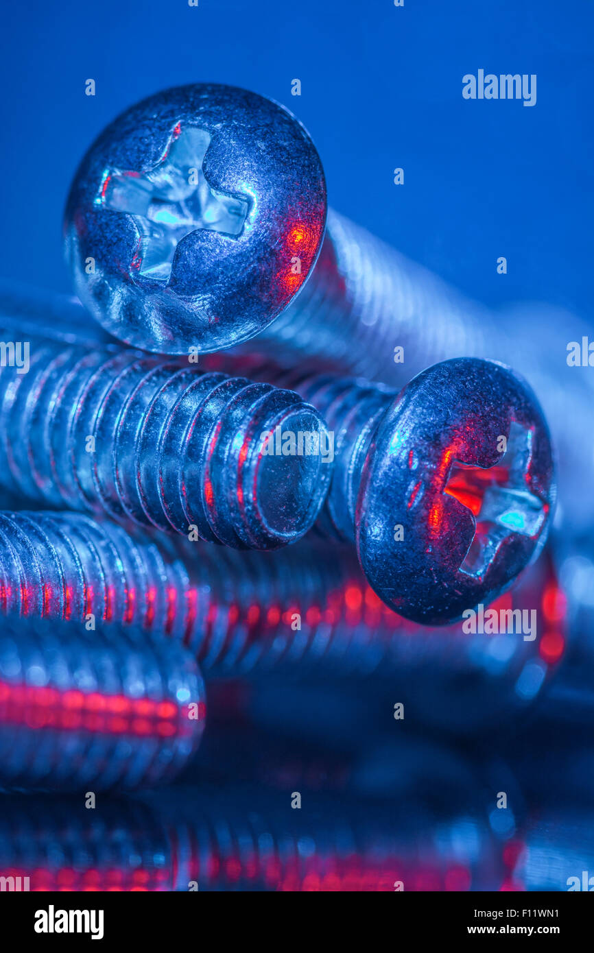 Macro-photo of small screw threaded bolts Stock Photo - Alamy