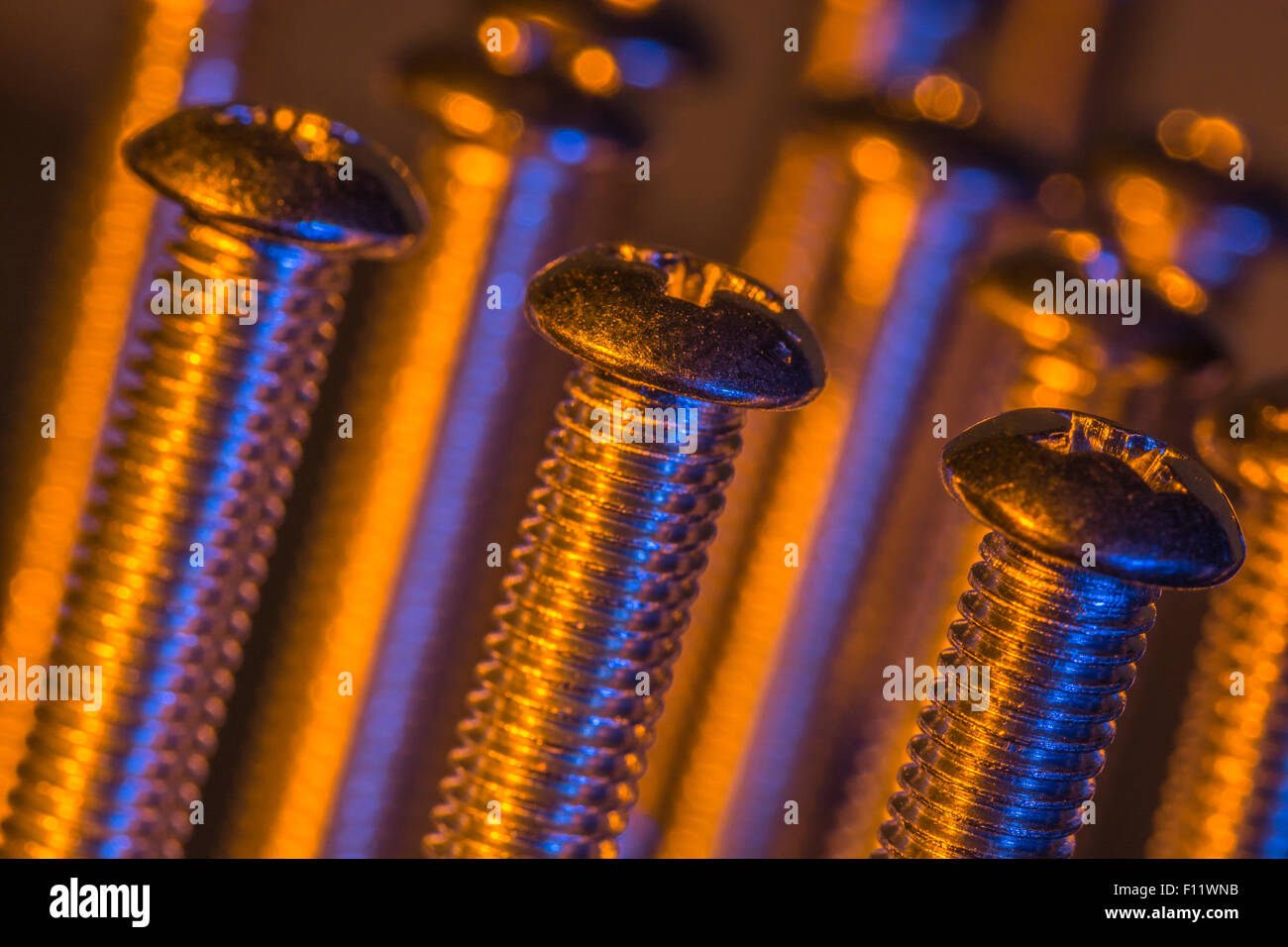Macro-photo of small screw threaded bolts Stock Photo - Alamy