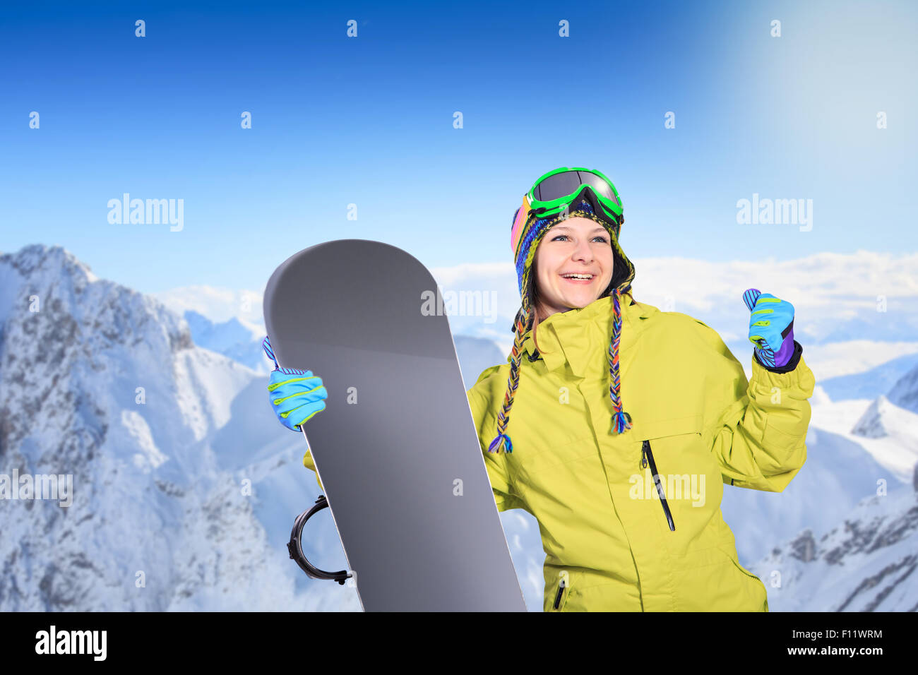 A female snowboarder on the piste in Alps, Europe Stock Photo - Alamy