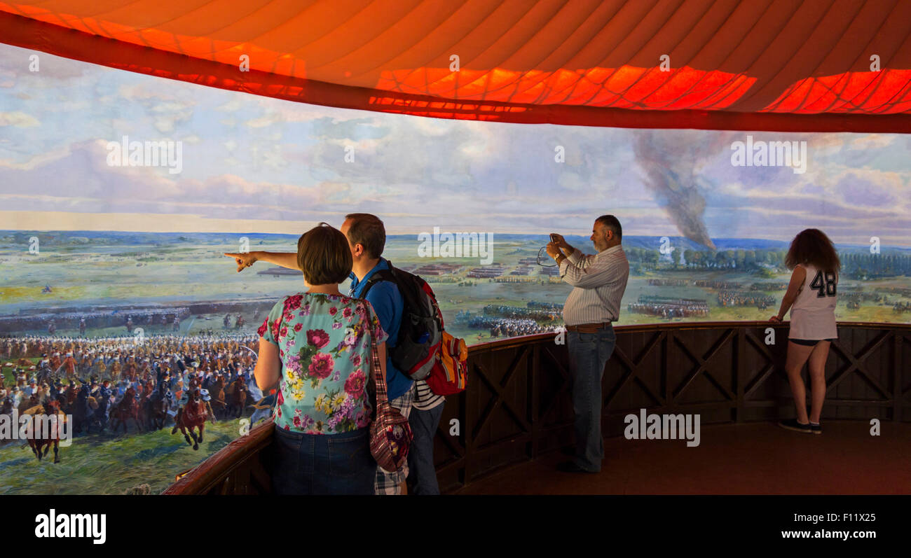 Tourists watching battle of Waterloo battlefield scenes in 360° fresco ...