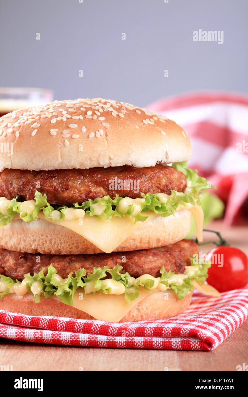 Appetizing double cheeseburger - ready to eat Stock Photo - Alamy