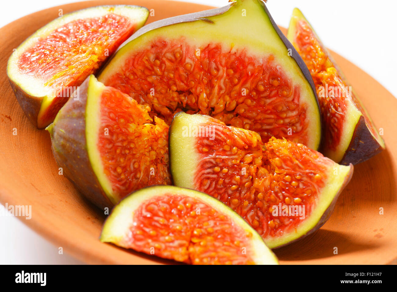 Fresh figs cut into slices Stock Photo - Alamy