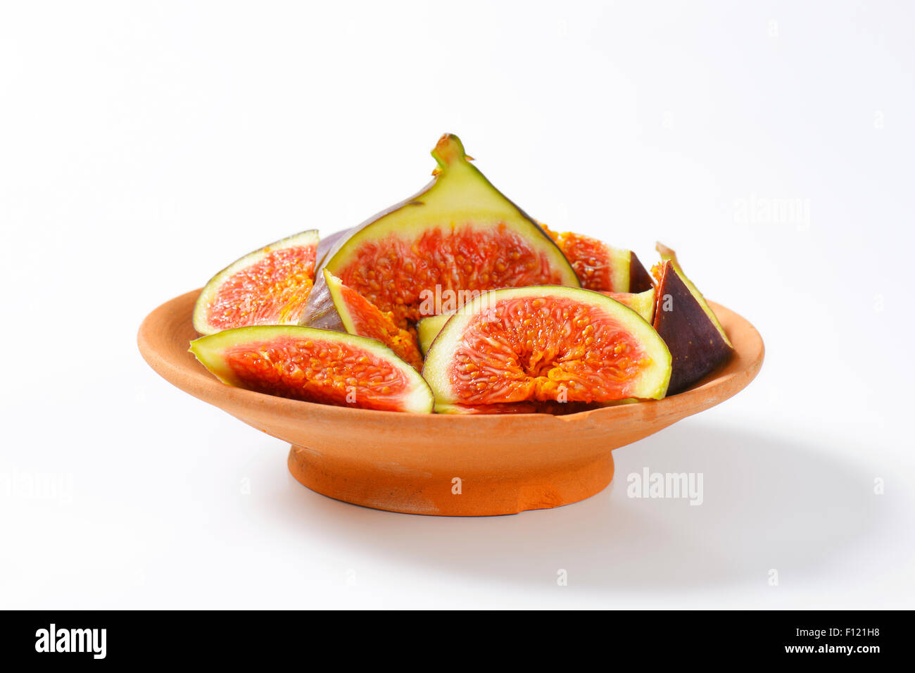Fresh figs cut into slices Stock Photo - Alamy