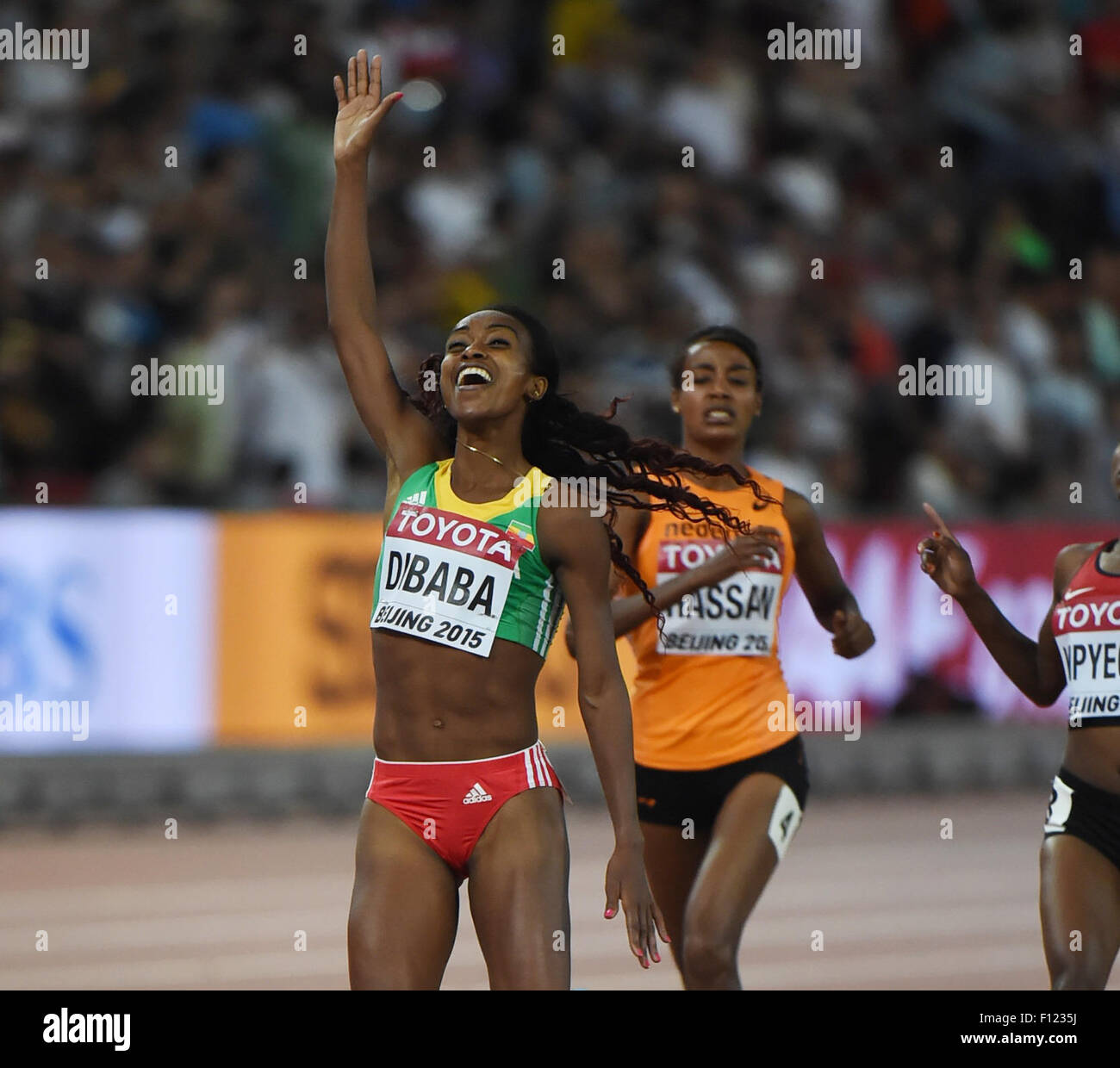 Beijing, China. 25th Aug, 2015. Ethiopia's Genzebe Dibaba (L ...