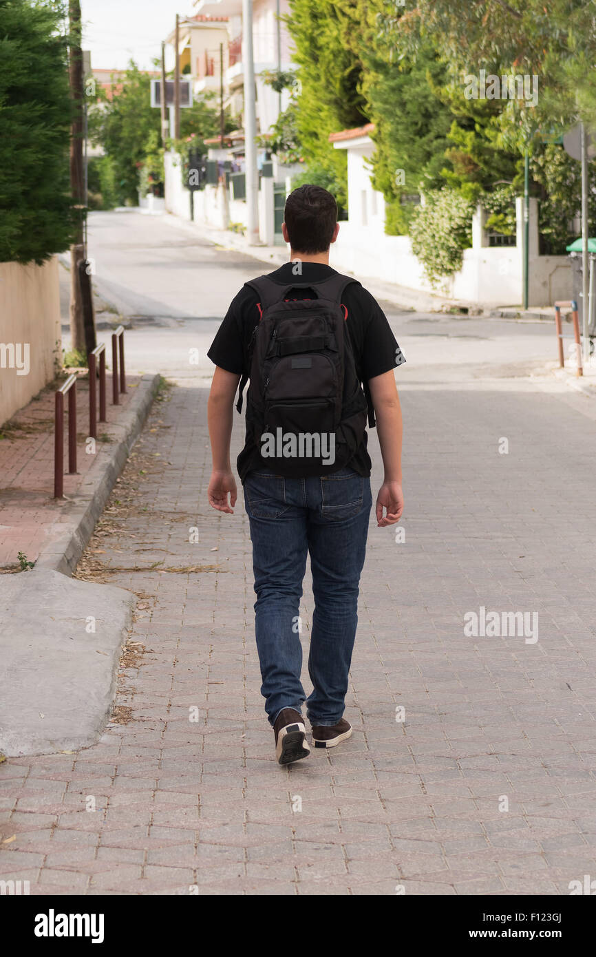 Schoolboy after finishing his class lessons Stock Photo - Alamy