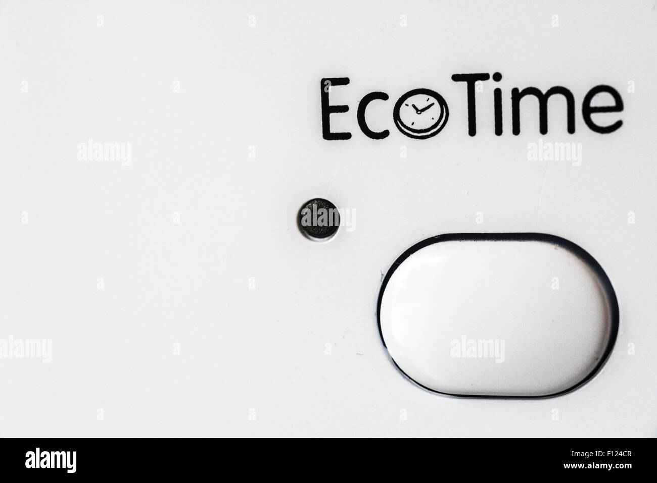 A closeup picture of an ecotime energy saving button Stock Photo - Alamy
