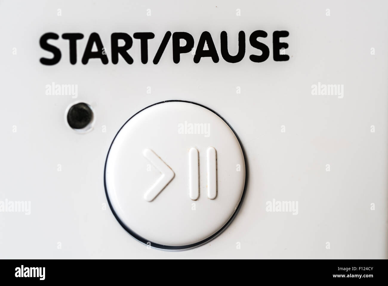 A closeup picture of a Start pause button Stock Photo - Alamy