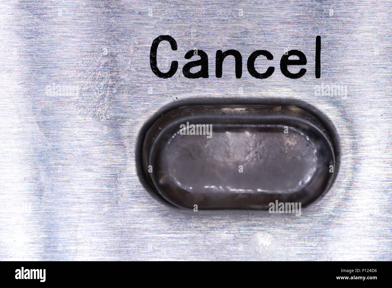 A closeup picture of a cancel button on a metalic background Stock ...
