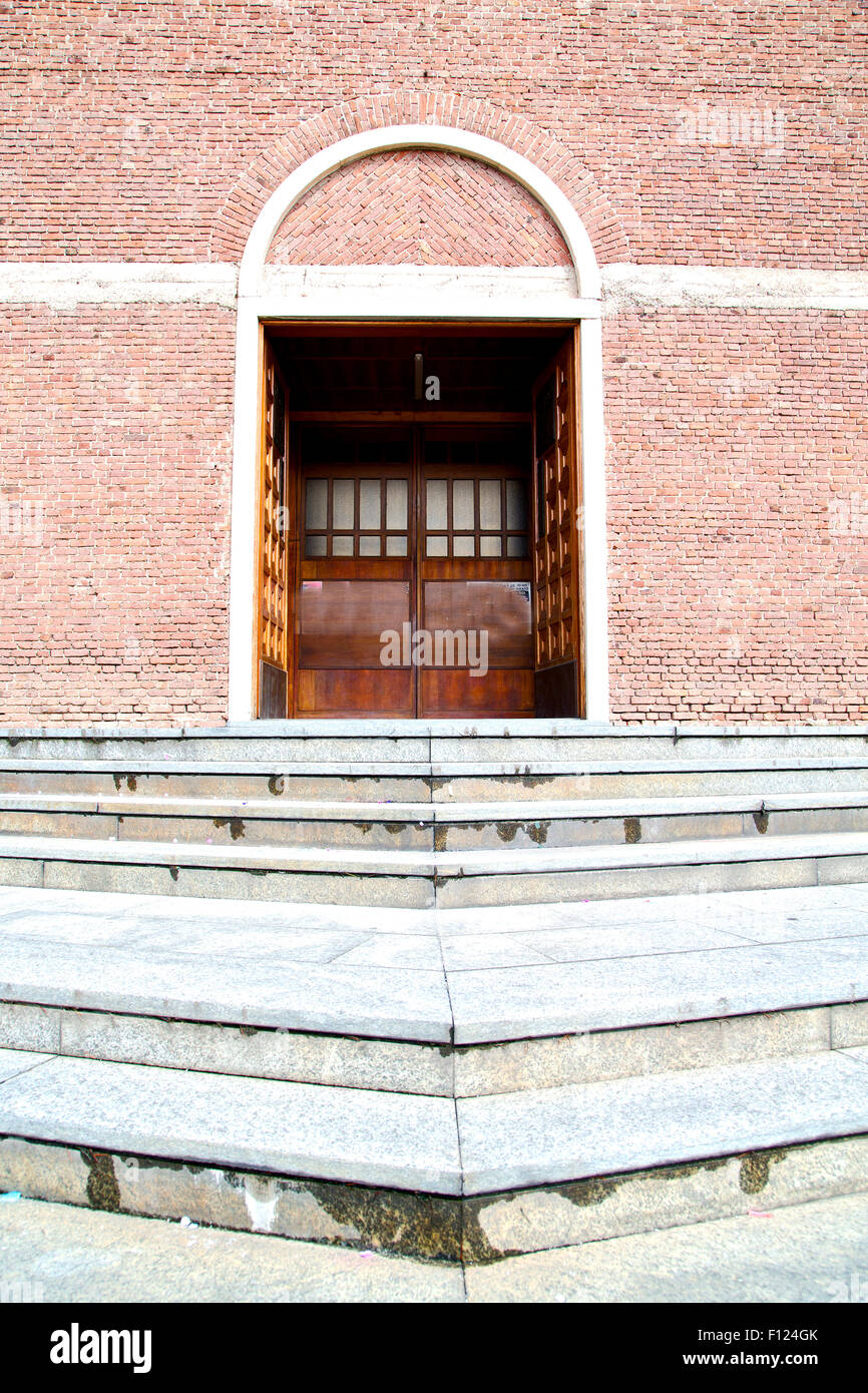 italy lombardy in the cardano al campo old church closed brick tower ...