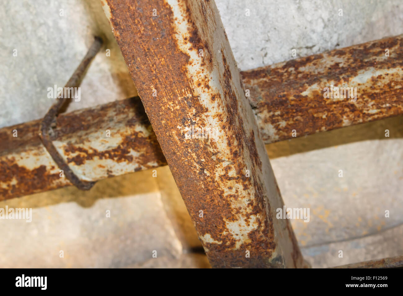 Close up Rusty beams under roof background Stock Photo - Alamy