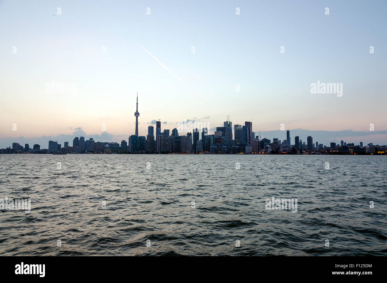 Skyline of Toronto over Ontario Lake at sunset Stock Photo - Alamy