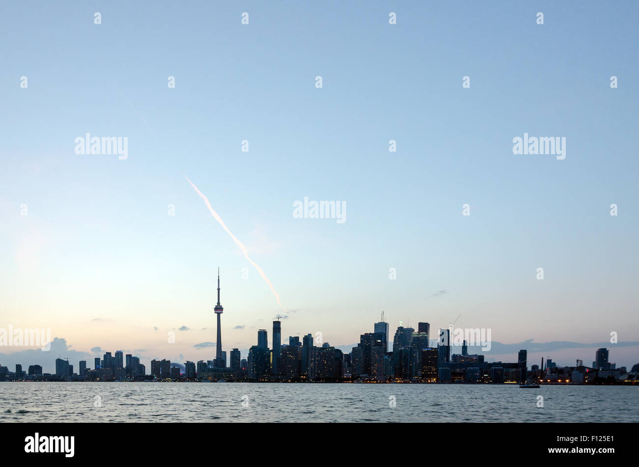 Skyline of Toronto over Ontario Lake at sunset Stock Photo - Alamy