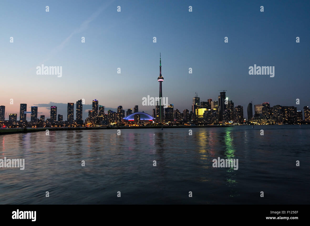 Skyline of Toronto over Ontario Lake after sunset Stock Photo - Alamy