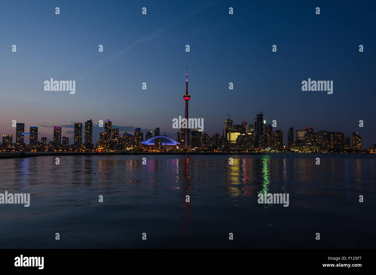 Skyline of Toronto over Ontario Lake after sunset Stock Photo - Alamy