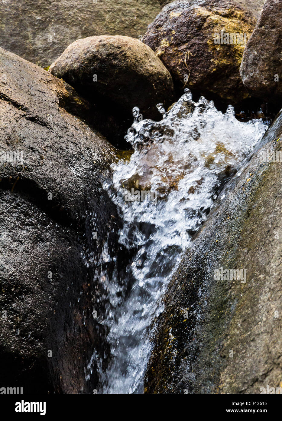 Water flowing down rocks Stock Photo - Alamy