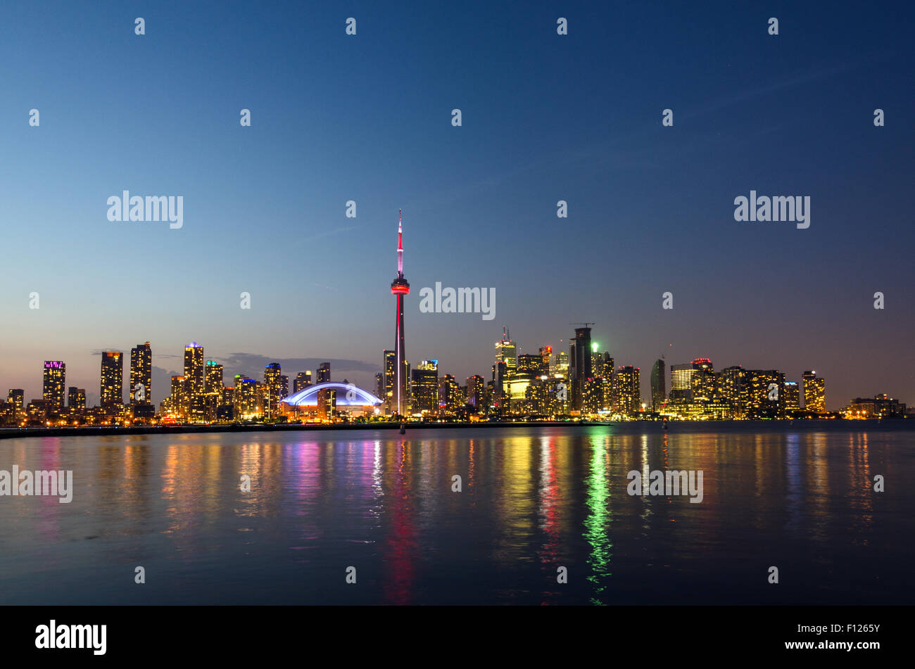 Skyline of Toronto over Ontario Lake after sunset Stock Photo - Alamy