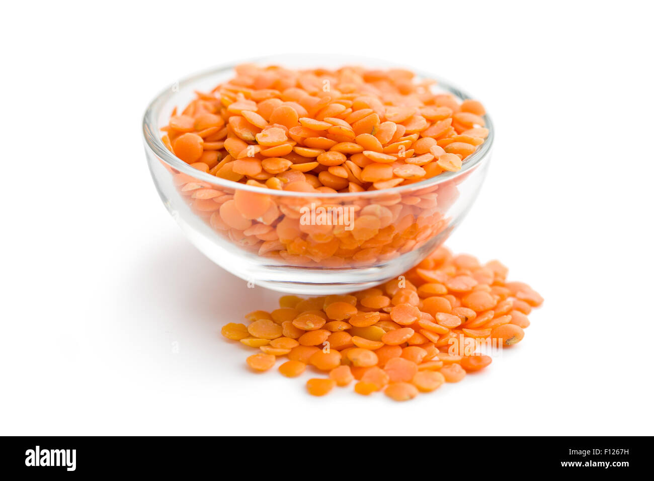 red lentils in bowl on white background Stock Photo - Alamy