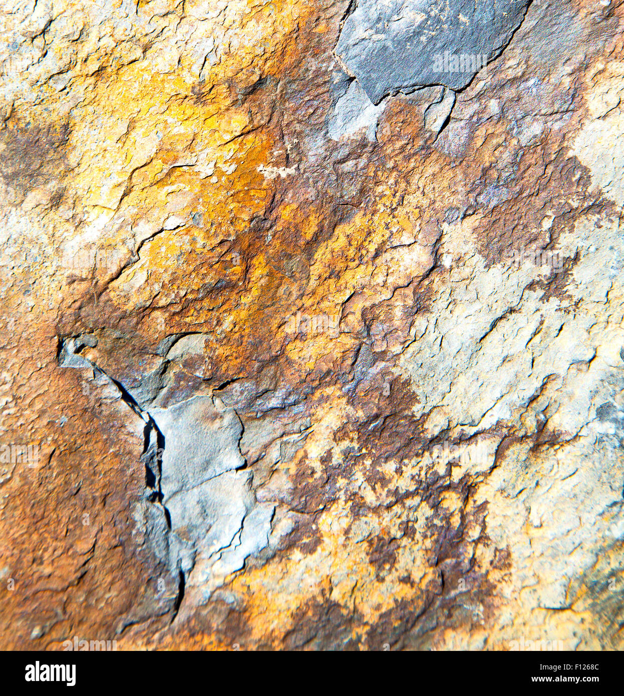 rocks stone and red orange gneiss in the wall of morocco Stock Photo ...