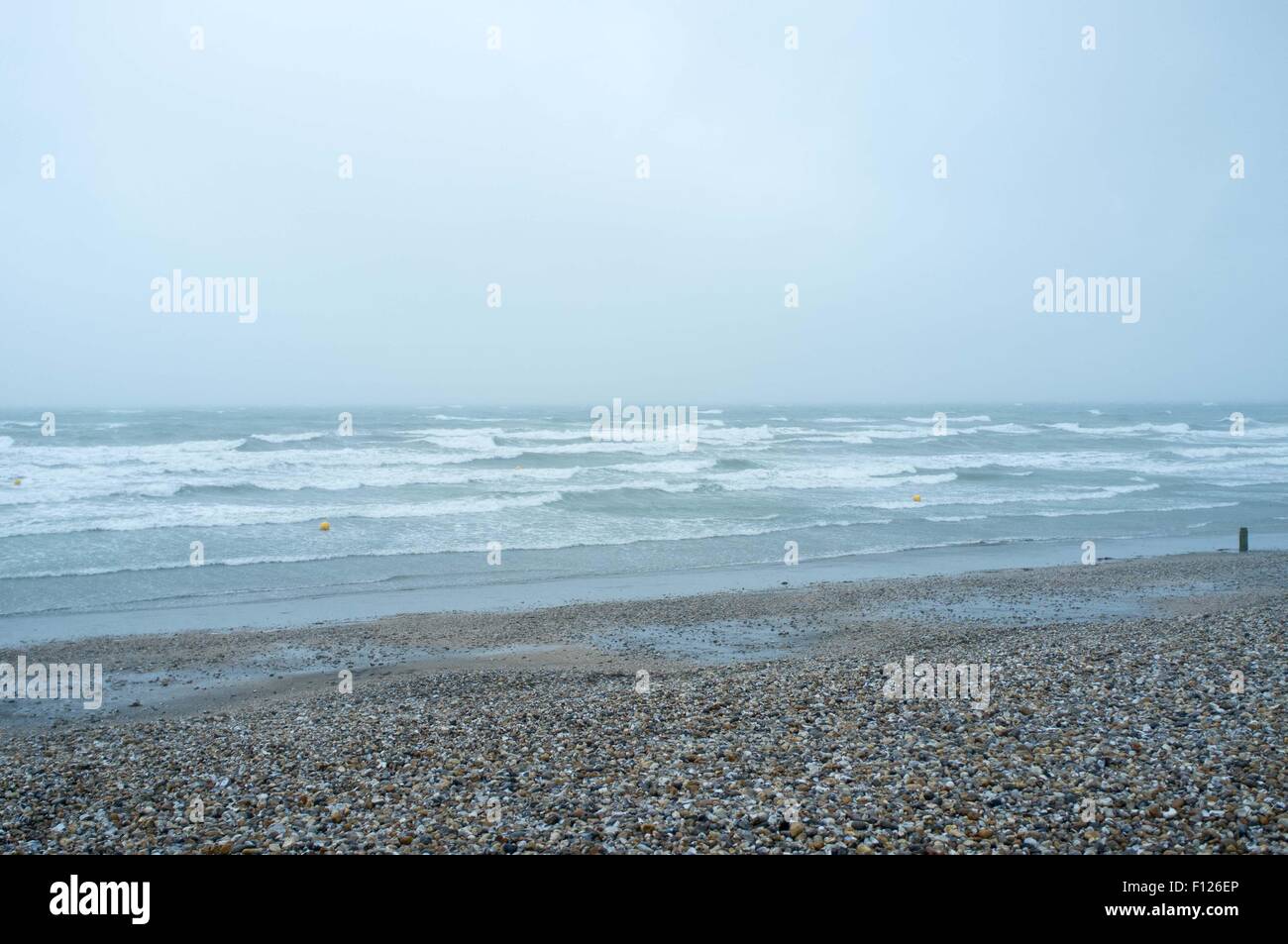A wet and windy day at Bracklesham Bay, West Sussex Stock Photo - Alamy