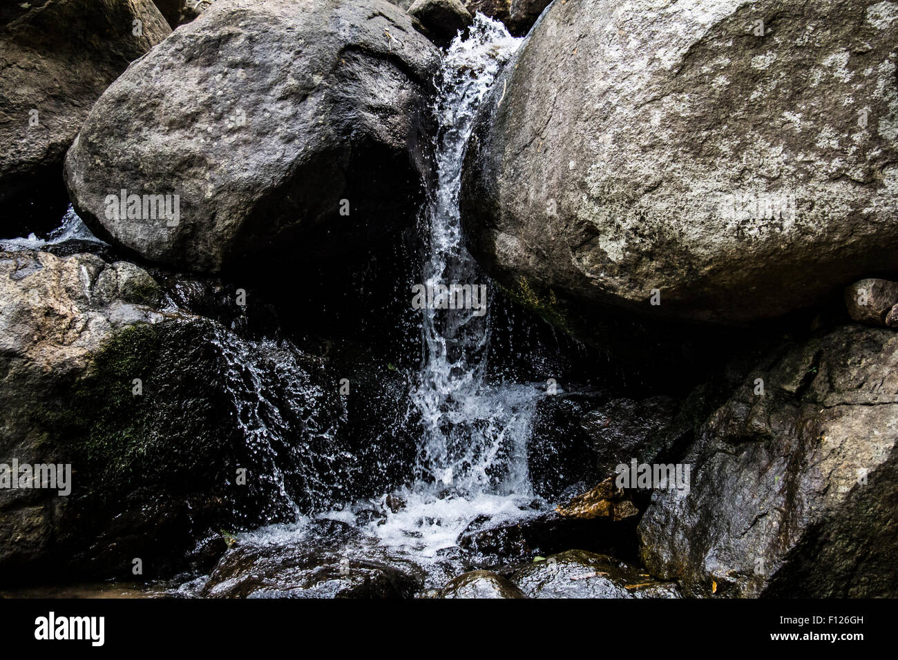 Water flowing down rocks Stock Photo - Alamy