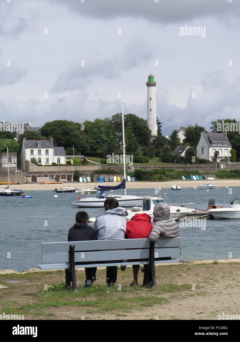 Bénodet: moored yachts and lighthouse from Sainte-Marine Stock Photo ...