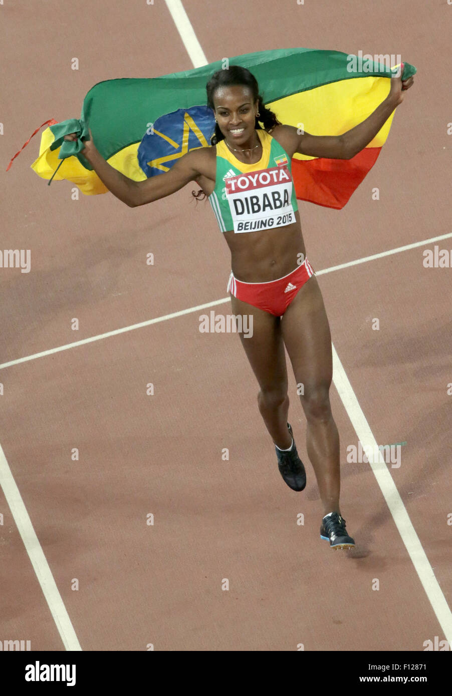 Beijing, China. 25th Aug, 2015. Genzebe Dibaba of Ethiopia celebrates ...