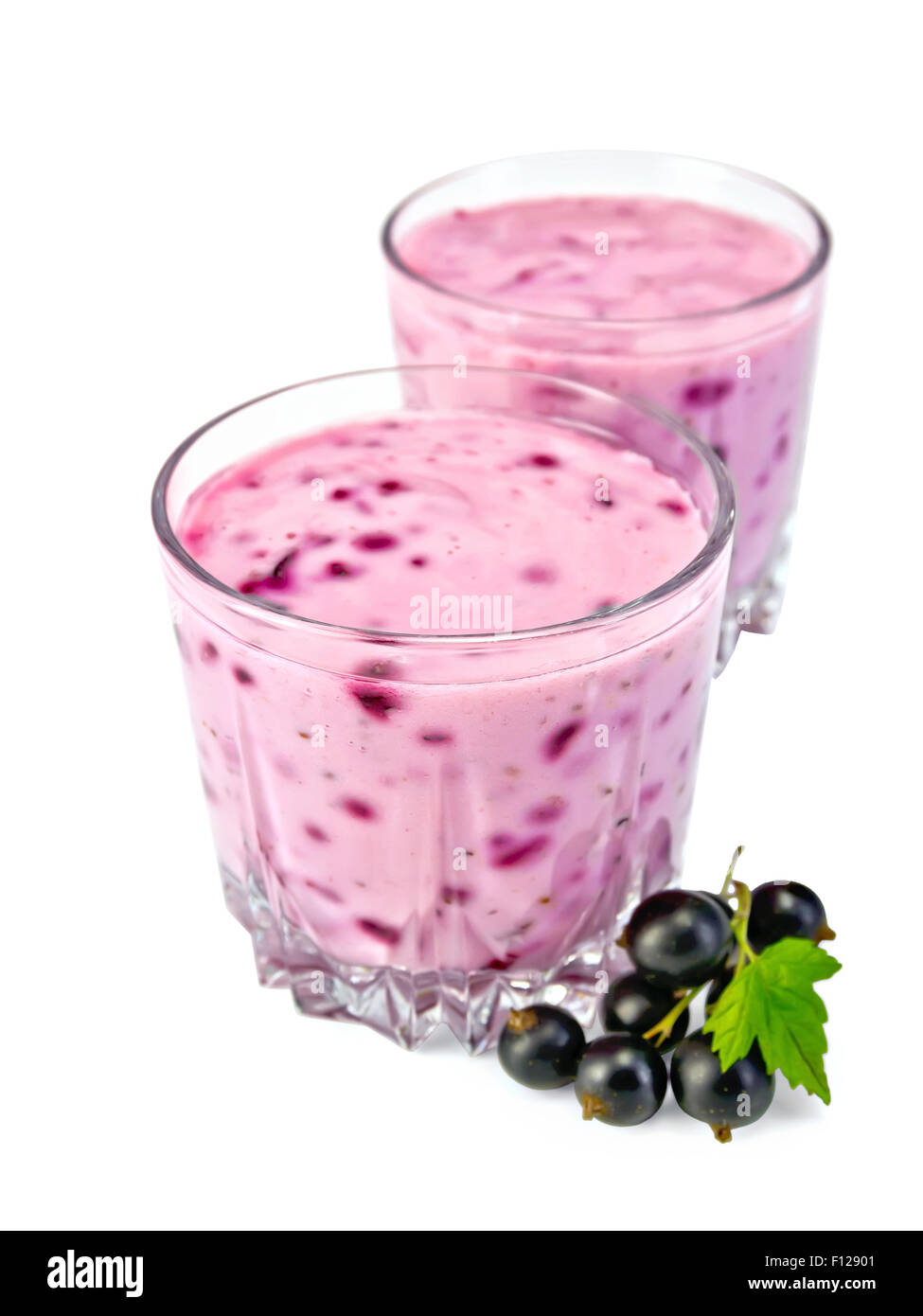 Milkshake with black currants in two glassful Stock Photo - Alamy