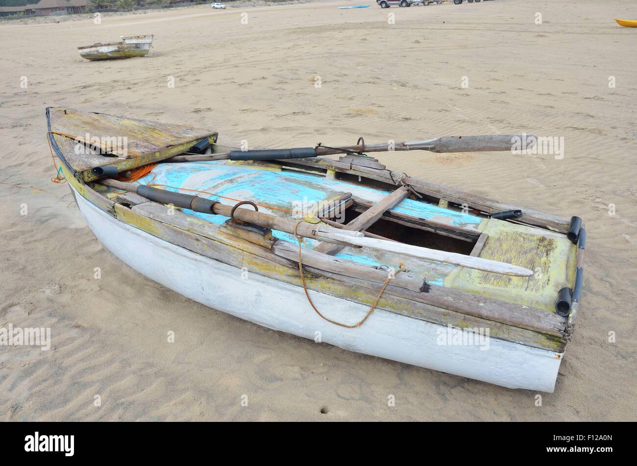 This old, unsafe fishing boat lying on the beach at Inhambane ...