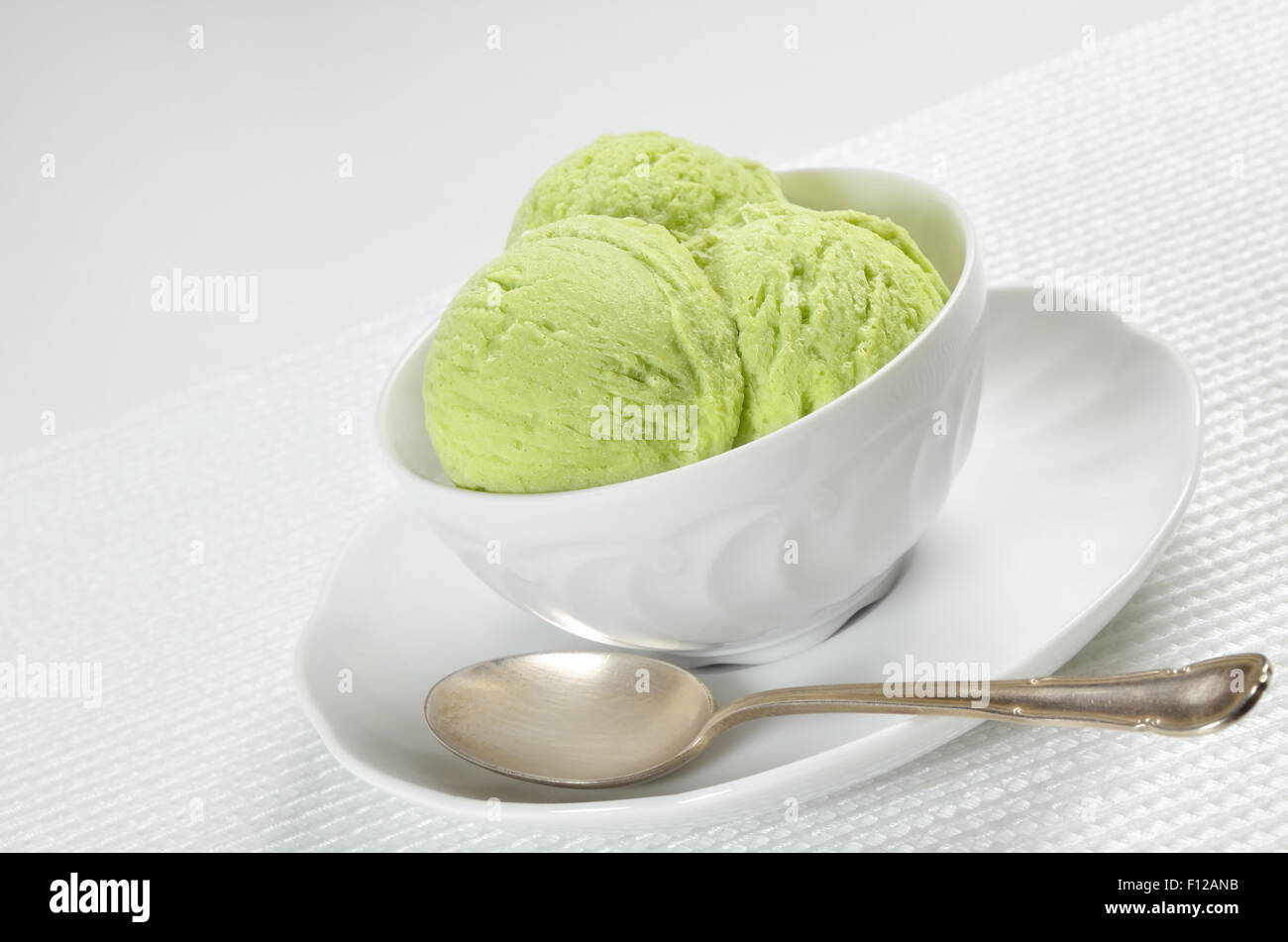 Green ice cream scoop white background hi-res stock photography and ...