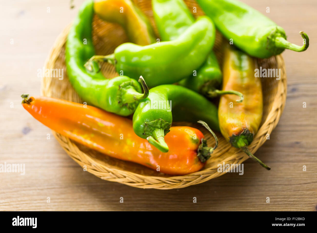 Variety of fresh organic peppers on the table Stock Photo - Alamy