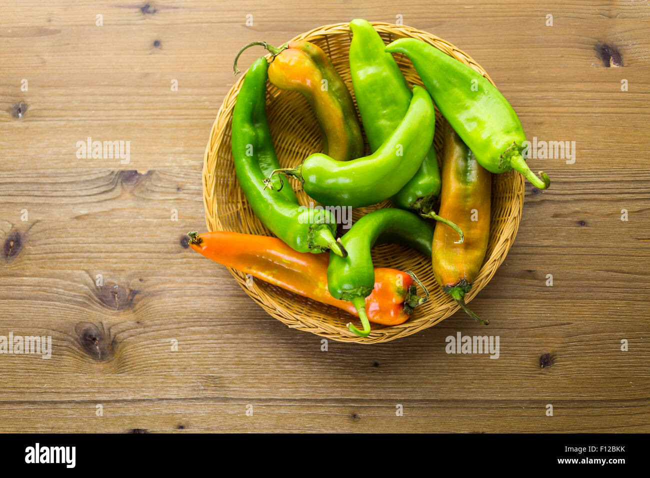 Variety of fresh organic peppers on the table Stock Photo - Alamy