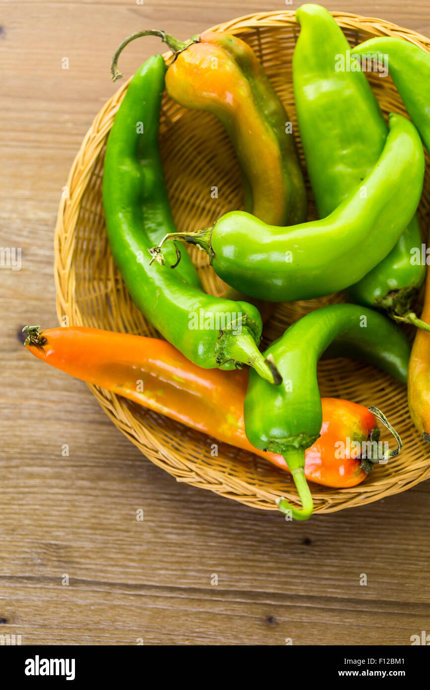 Variety of fresh organic peppers on the table Stock Photo - Alamy