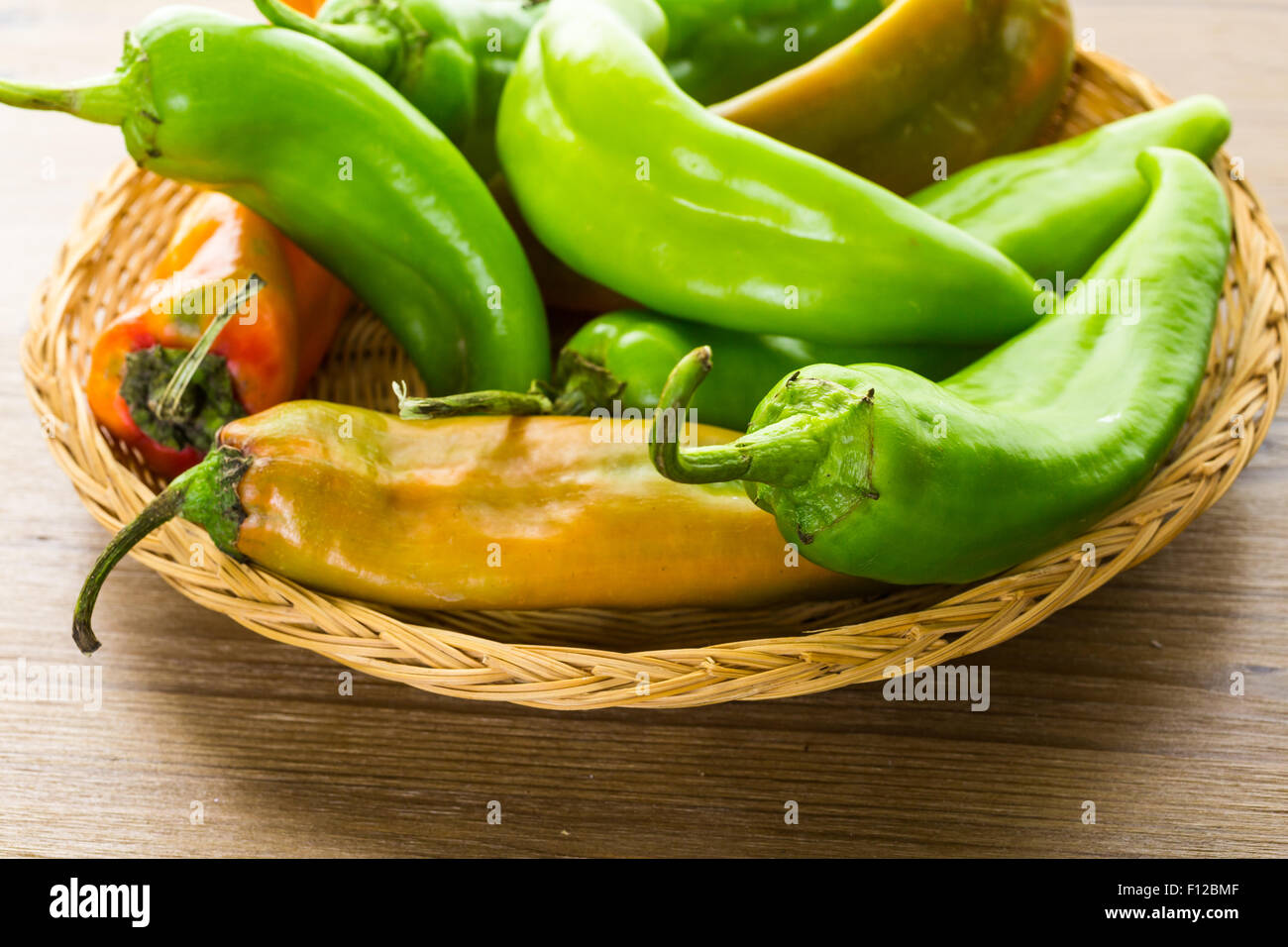 Variety of fresh organic peppers on the table Stock Photo - Alamy